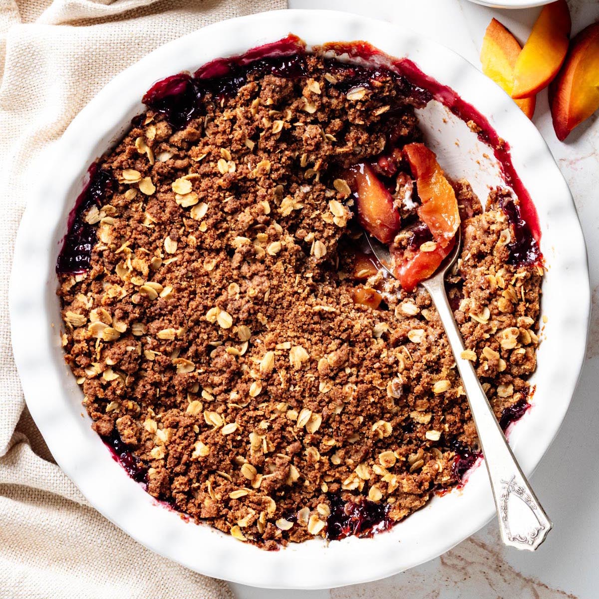 Blueberry Peach Crisp With Ginger Oat Topping - Heavenly Home Cooking